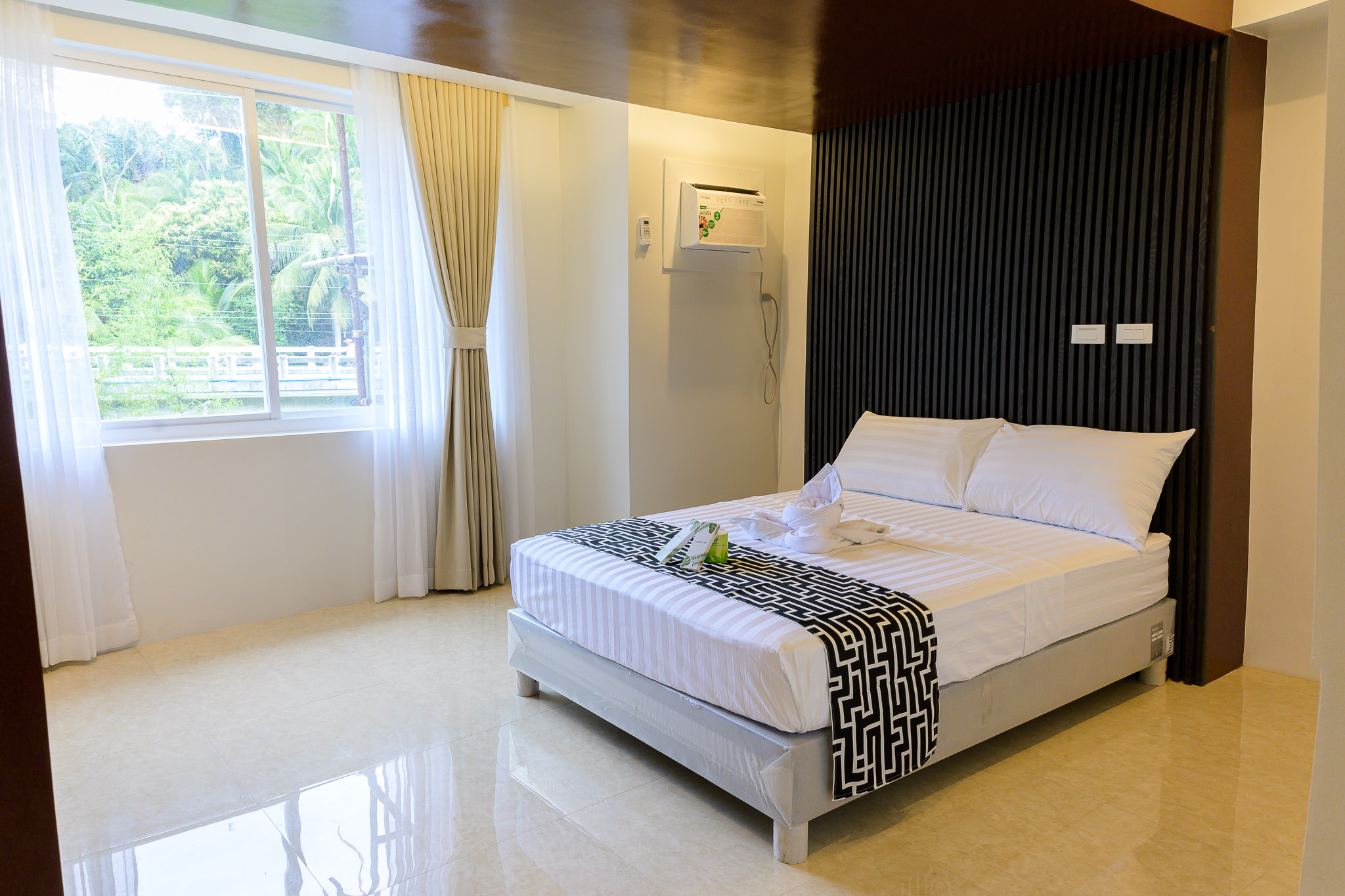 Accomodation – D' Elmer's Resort and Convention Hotel